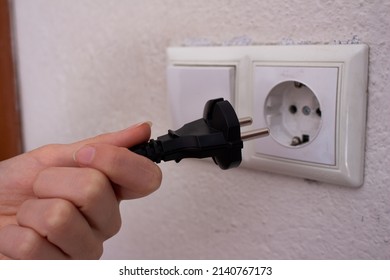 Closeup Hand Inserting Plug Into Outlet Stock Photo 2140767173 ...