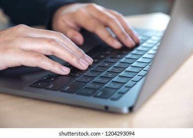 Hand On Laptop Touchpad Tapping Scrolling Stock Photo (Edit Now) 2105229023