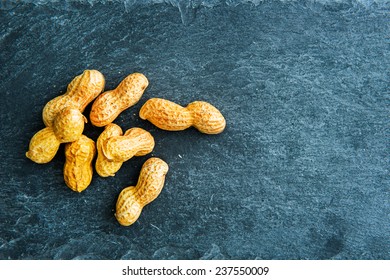 Closeup On Peanuts On Stone Substrate Stock Photo 237550009 | Shutterstock