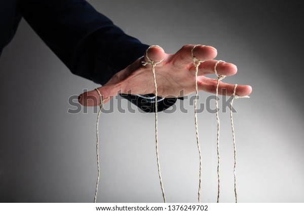2,851 Hand Controling Puppet Stock Photos, Images & Photography ...
