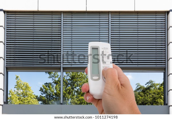 Closeup Persons Hand Using Remote Open Stock Photo (Edit Now) 1011274198