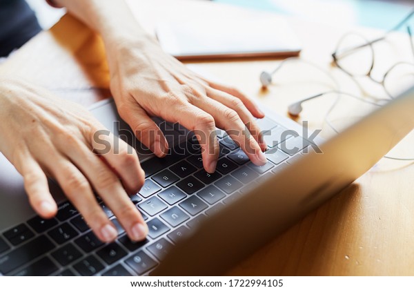 Closeup Two Hands Typing On Laptop Stock Photo 1722994105 | Shutterstock