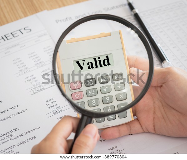 Closeup Valid Text On Calculator Magnifying Stock Photo 389770804 ...
