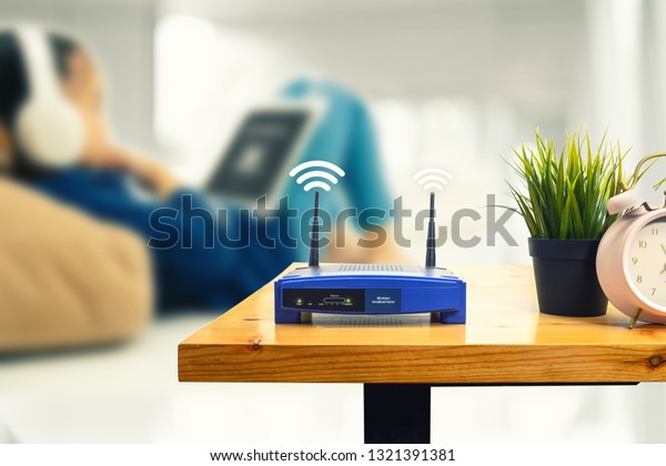 Closeup Wireless Router Man Using Smartphone Stock Photo (Edit Now ...
