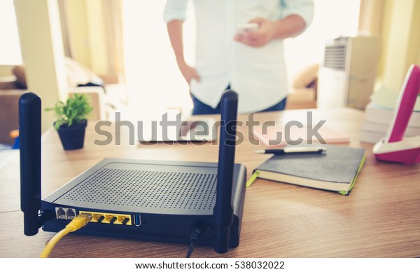 Closeup Wireless Router Man Using Smartphone Stock Photo 538032022 ...