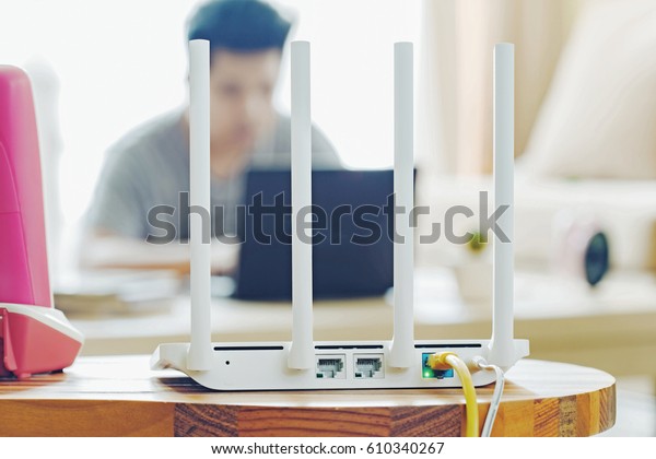 Closeup Wireless Router Man Using Notebook Stock Photo 610340267 ...