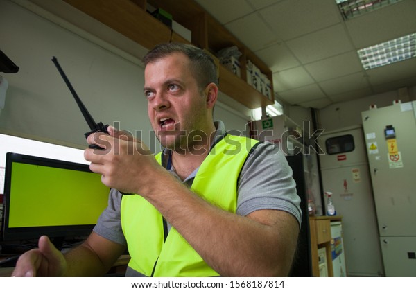 Closeup Young Security Guard Talking On Stock Photo 1568187814 ...