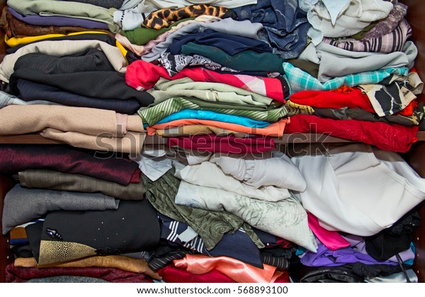 Clothes Piles Stacked Disarray Stock Photo (Edit Now) 568893100