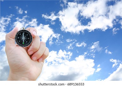 Compass Hand Against Cloud Sky Background Stock Photo 689136553 ...