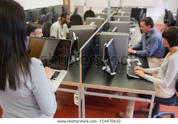 Computer Class Working Teacher Typing On Stock Photo (Edit Now) 114470632