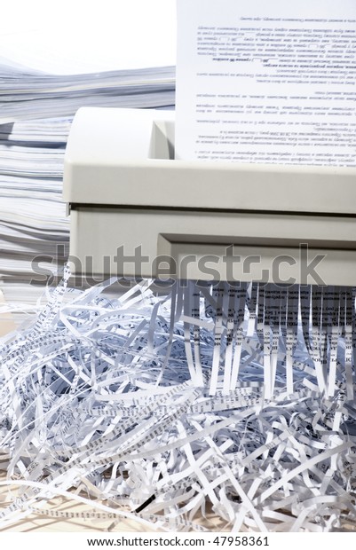 Confidential Document Being Put Through Shredder 스톡 사진(지금 편집) 47958361