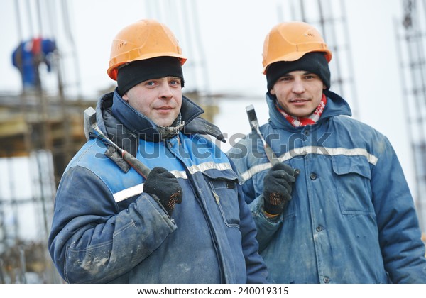 Construction Carpenter Workers Construction Site Assembling Stock Photo ...