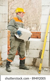 2,568 Worker lifting brick Images, Stock Photos & Vectors | Shutterstock