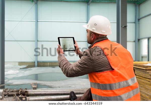 Construction Supervisor Checks Interior New Warehouse Stock Photo ...