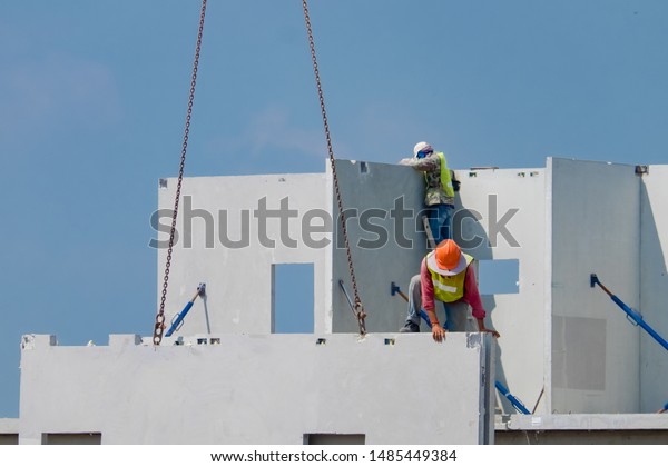 Construction Worker Installing Precast Concrete Wall Stock Photo (Edit ...