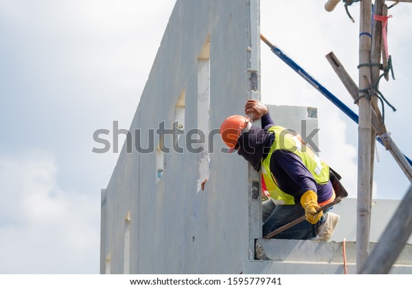 Construction Worker Installing Precast Concrete Wall Stock Photo ...