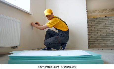 Construction Worker Measuring Wall Level Tool Stock Photo 1408036592 ...