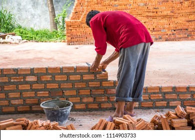 Construction Worker Placing Bricks On Cement Stock Photo 1114903733 ...
