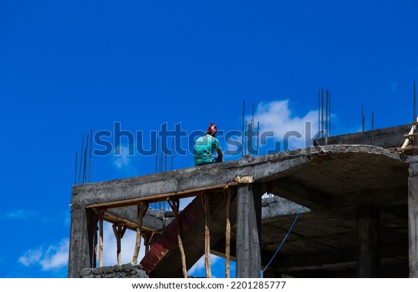Construction Worker Taking Rest Looking Away Stock Photo 2201285777 ...