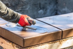 Worker using cement trowel featuring construction, construction site ...