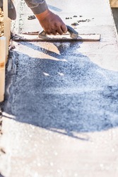 Worker using cement trowel featuring construction, construction site ...