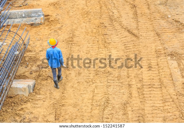 Construction Worker Walking On Track Traces Stock Photo (Edit Now ...