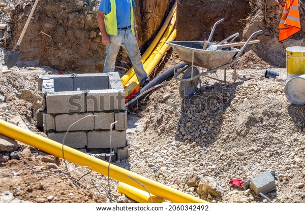 Construction Worker Working Inside Trench Installing Stock Photo ...