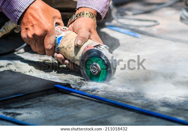 Construction Workers Grinding Stock Photo (Edit Now) 211018432