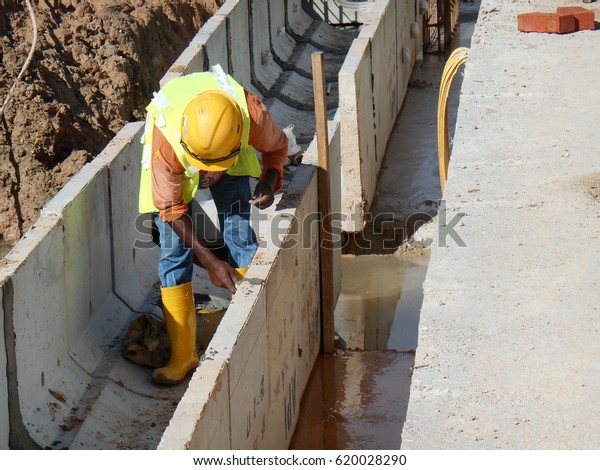 Construction Workers Installing Precast Ushape Concrete Stock Photo ...