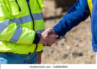 Construction Workers Shaking Hands Stock Photo 1180869844 | Shutterstock