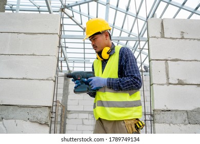 Construction Workers Using Drilling Power Tool Stock Photo 1789749134 ...