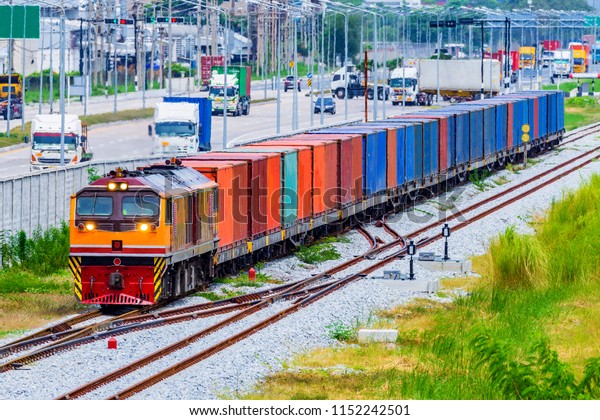 Container Freight Train Running Through Industrial Stock Photo (Edit ...