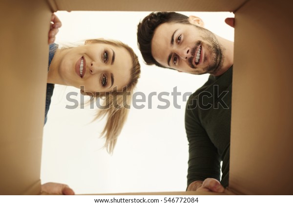 Couple Looking Down Camera Through Cardboard Stock Photo 546772084 ...