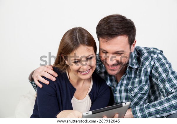 Couple Using Ipad Stock Photo (Edit Now) 269912045