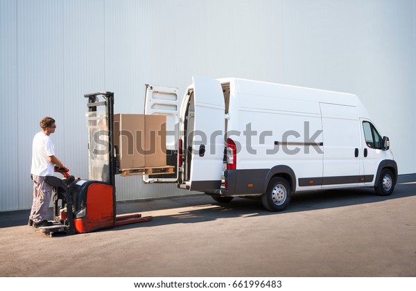 Courier Loading Van Parcels Stock Photo (Edit Now) 661996483
