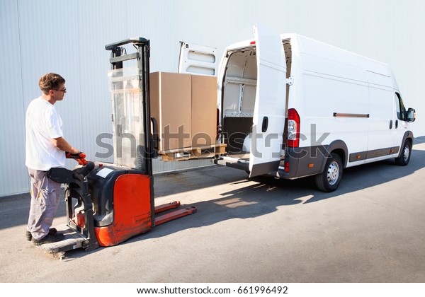 Courier Loading Van Parcels Stock Photo 661996492 | Shutterstock