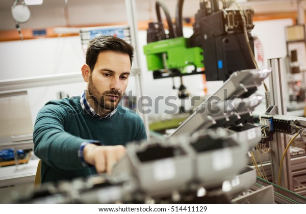 Creative Mechanical Engineer Working On Machines Stock Photo (Edit Now ...