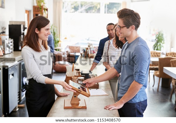 Стоковая фотография 1153408570: Customer Front Queue Paying Coffee Shop ...