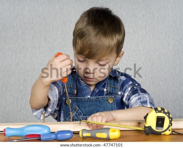 Cute Kid Construction Worker Playing Tools Stock Photo (Edit Now) 47747101