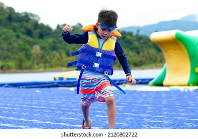 Cute Little Boy Using Float Walking Stock Photo (Edit Now) 2120802722