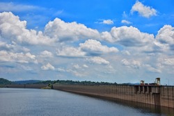Dam in the reservoir ii containing water, reservoir, and dam, an ...
