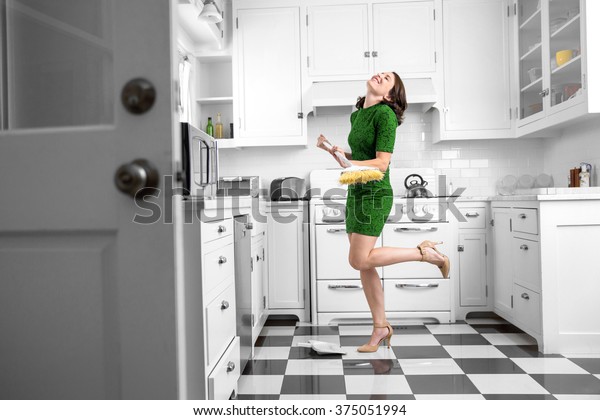 Dancing Singing While Cleaning Sweeping Kitchen Stock Photo (Edit Now ...