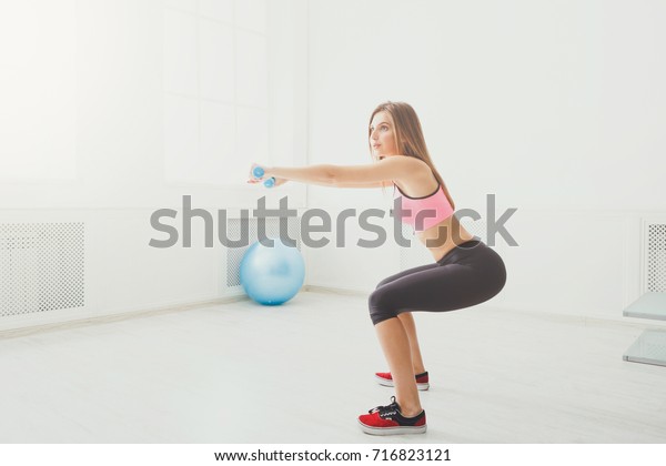 Deep Squat Side View Young Beautiful Stock Photo 716823121 | Shutterstock