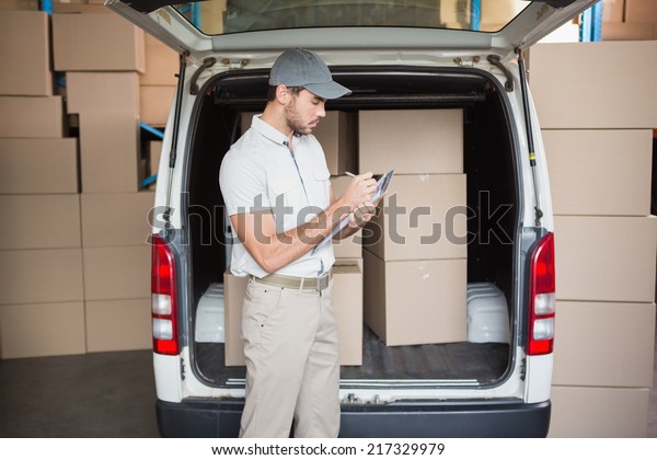 Delivery Driver Checking His List On Stock Photo 217329979 | Shutterstock