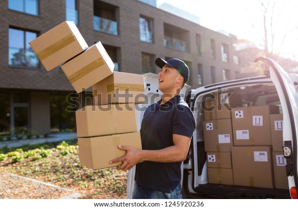 Delivery Man Dropping Boxes Stock Photo 1245920236 | Shutterstock
