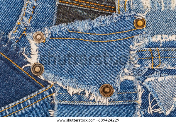 Denim Buttons On Ripped Denim Patch Stock Photo 689424229 | Shutterstock