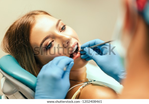 Dentist Examine Female Patient Braces Denal Stock Photo (Edit Now ... Dentist Examine Female Patient Braces Denal Stock Photo (Edit Now ...