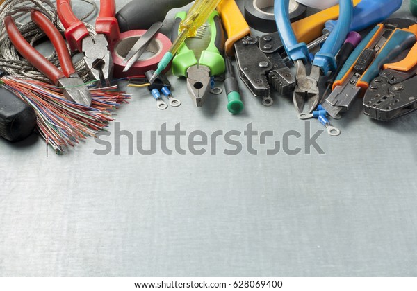 Different Electrical Tools On Metallic Background Stock Photo 628069400 ...