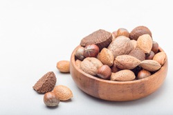 Different kinds of nuts in the shell featuring different, kind, and nut ...