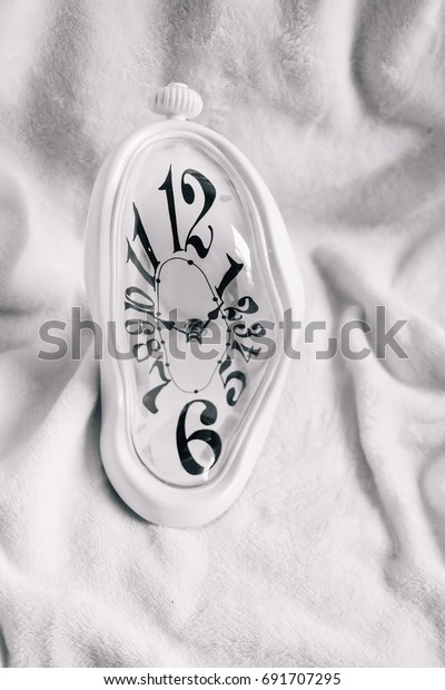 Distorted Soft Melting Clock Isolated On Stock Photo (Edit Now) 691707295